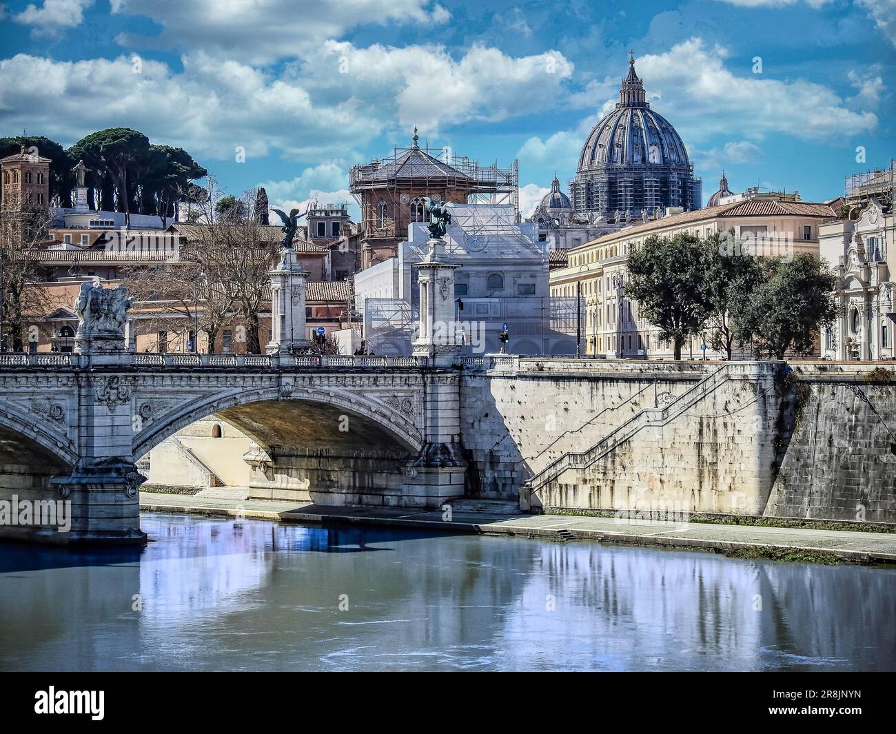 A daytime panoramic shot of Vatican City, taken from the Tiber River ...