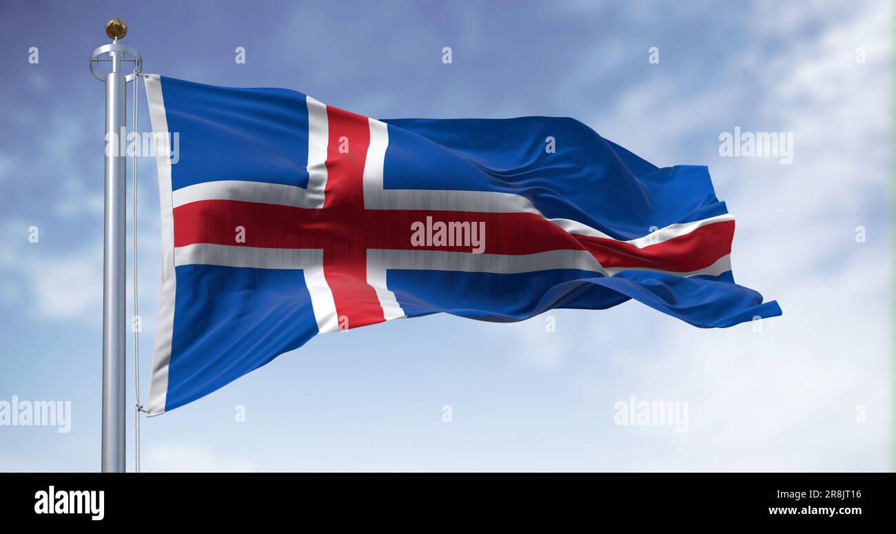 Close-up view of the Iceland national flag waving in the wind. Blue ...