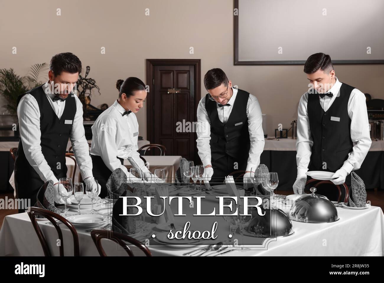 Butler school. People during table setting lesson indoors Stock Photo ...