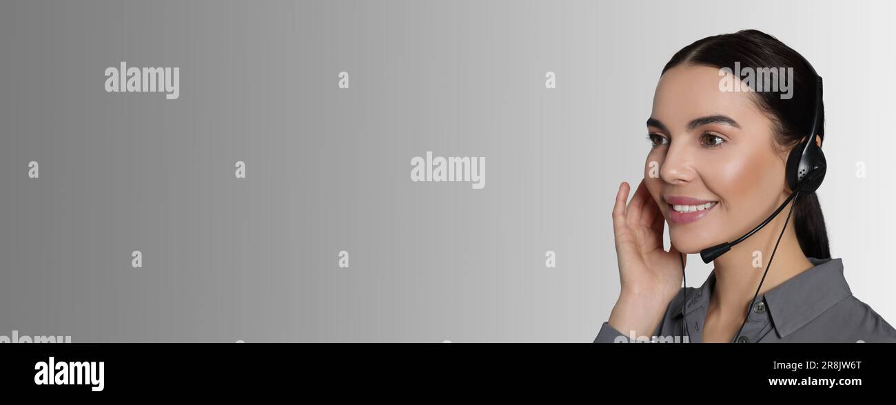 Hotline operator with headset on light grey background, space for text ...