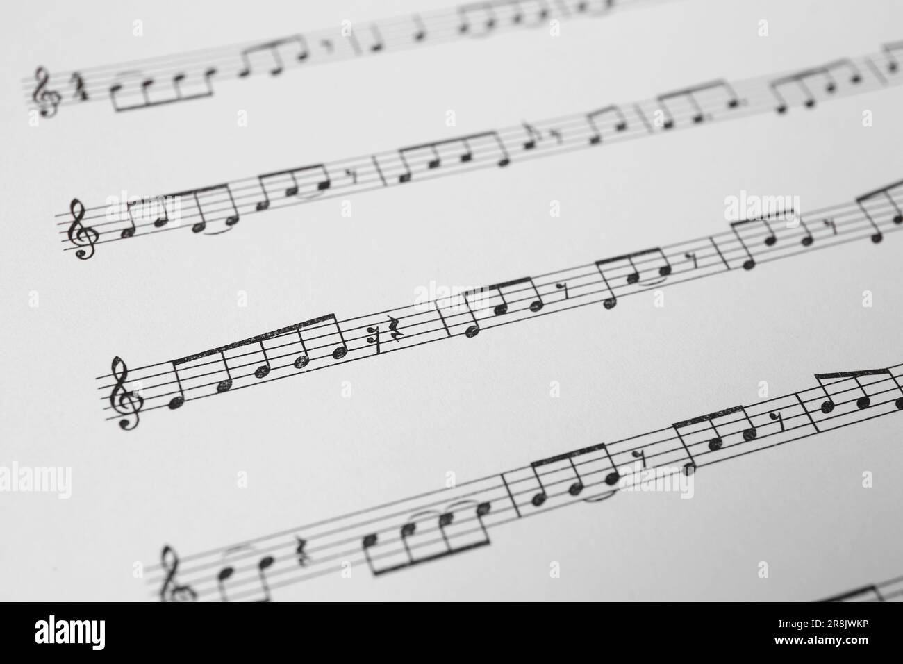 Sheet of paper with music notes as background, closeup Stock Photo - Alamy