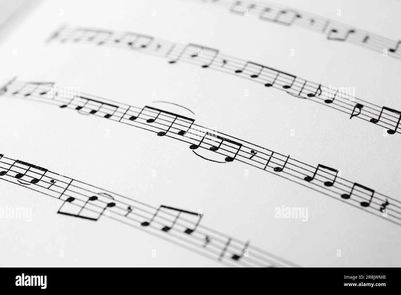 Sheet of paper with music notes as background, closeup Stock Photo - Alamy
