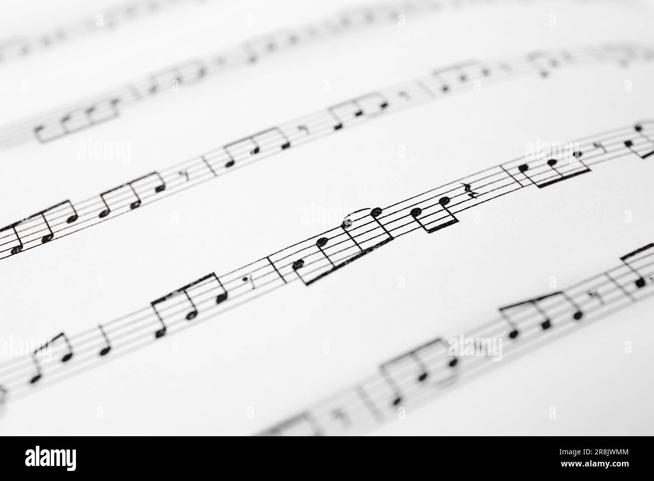 Sheet of paper with music notes as background, closeup Stock Photo - Alamy