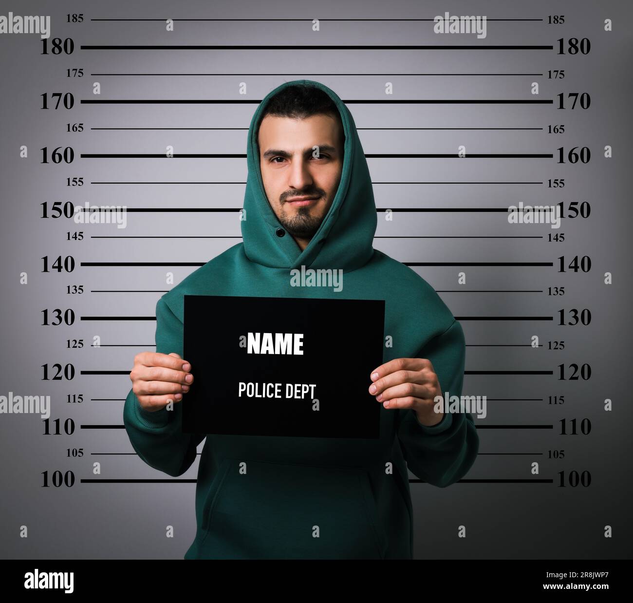 Criminal mugshot. Arrested man with blank card against height chart ...