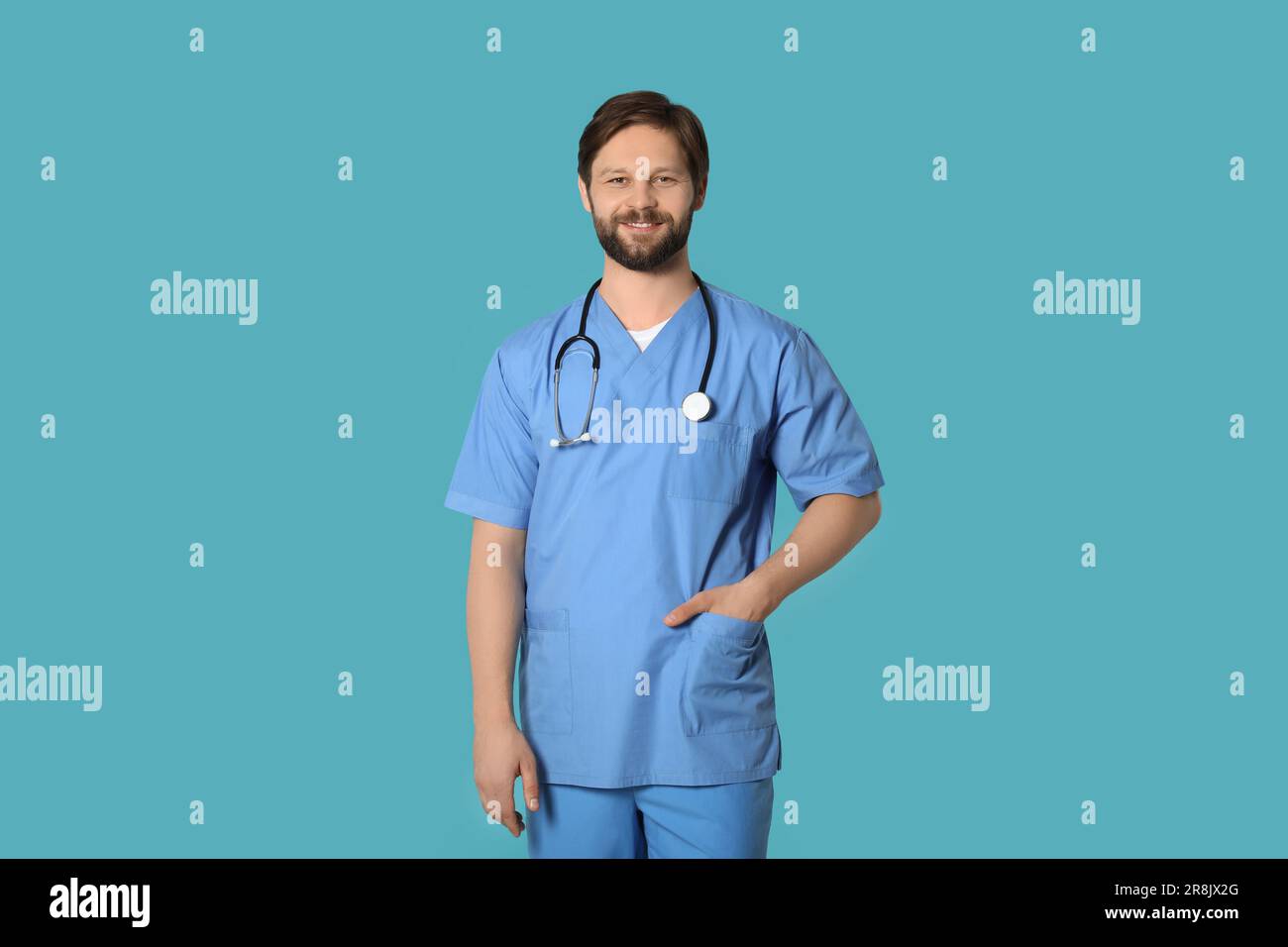Happy doctor or medical assistant (male nurse) with stethoscope on ...