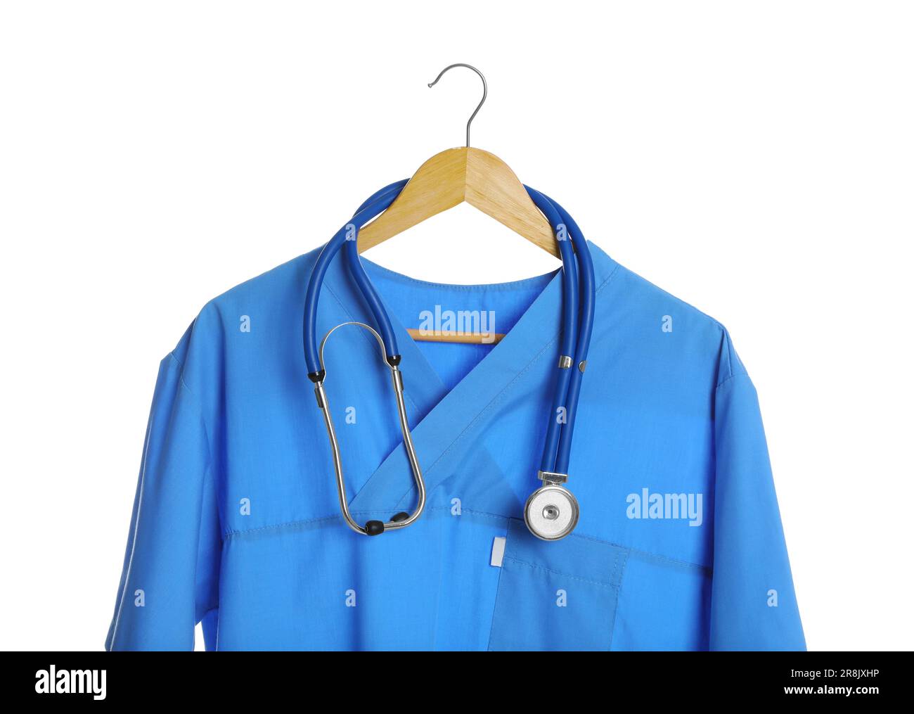 Light blue medical uniform and stethoscope on white background Stock ...