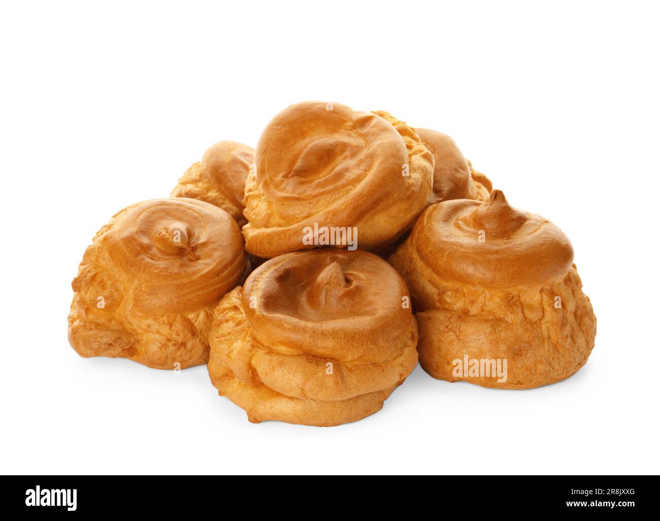 Pile of delicious profiteroles on white background Stock Photo - Alamy
