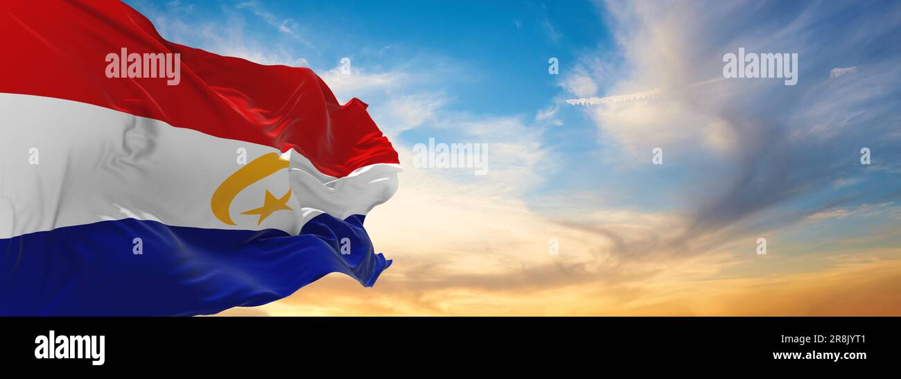 official flag of Johor Bahru Malaysia at cloudy sky background on ...