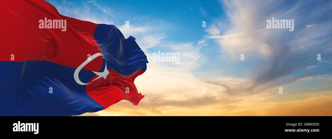 official flag of Kulai, Johor Malaysia at cloudy sky background on ...