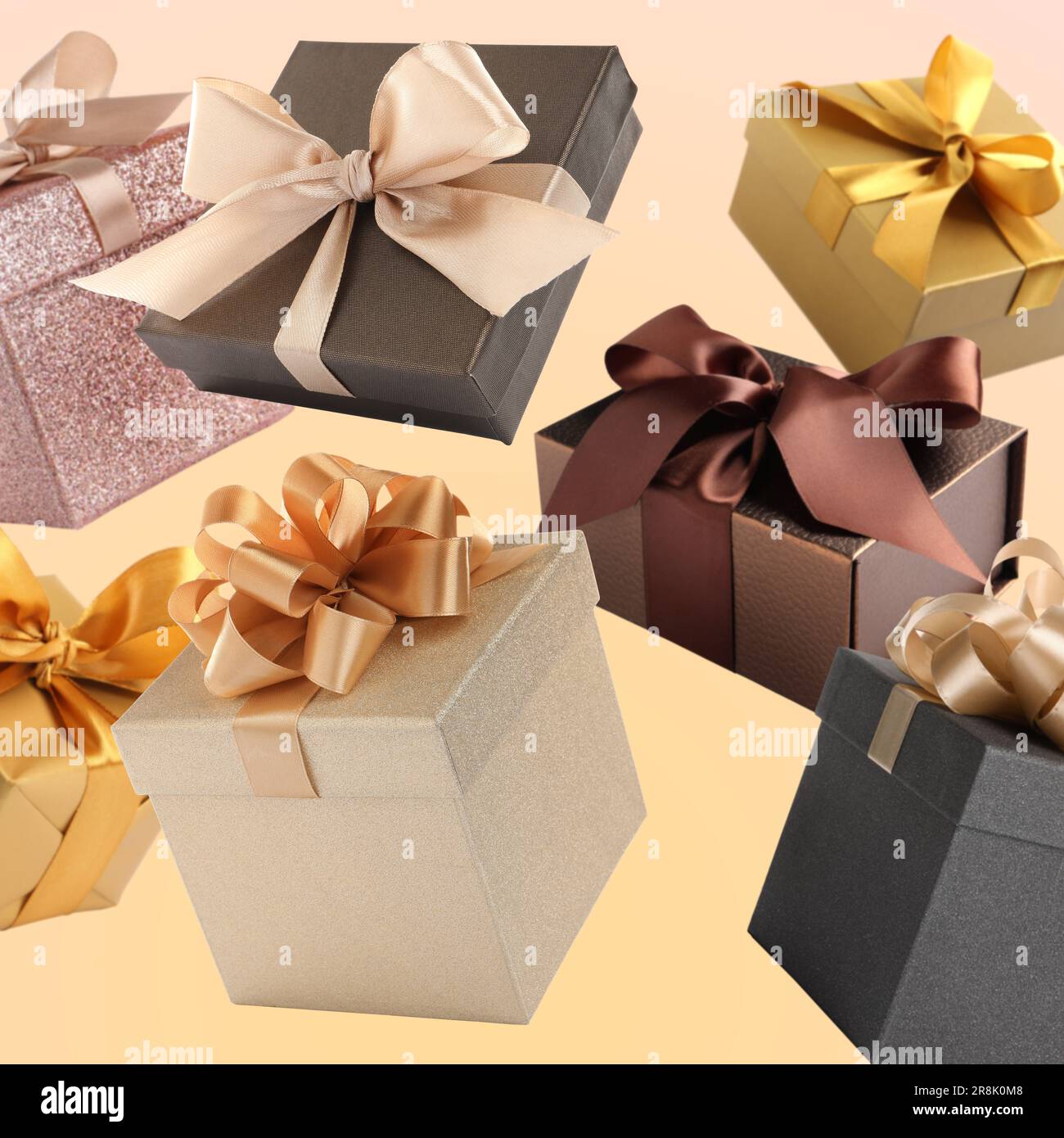 Many beautiful gift boxes falling on beige and yellow gradient ...