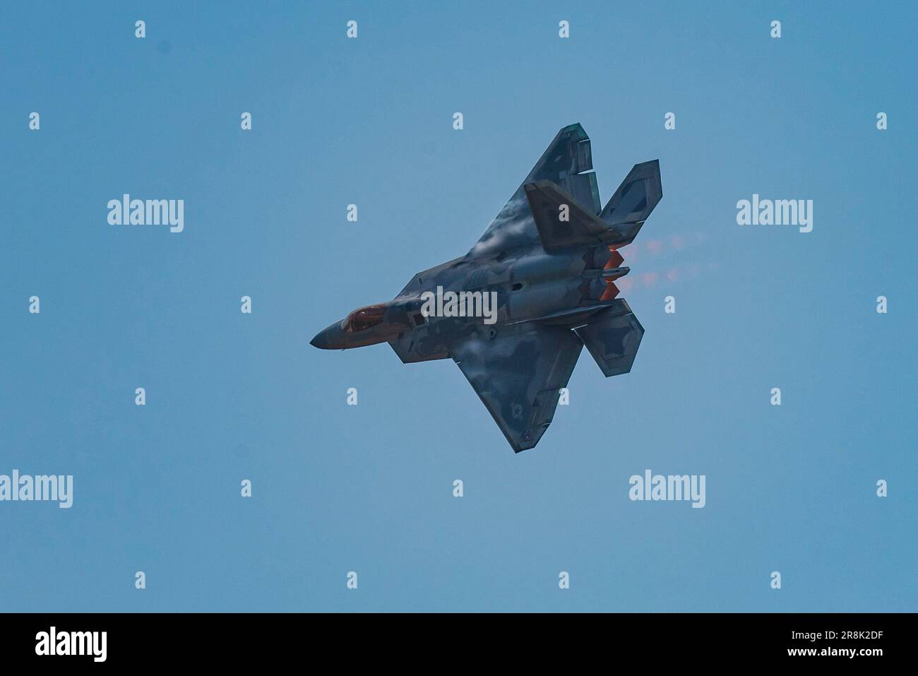 An aircraft from the U.S. Air Force F-22 Raptor Demo Team, piloted by ...