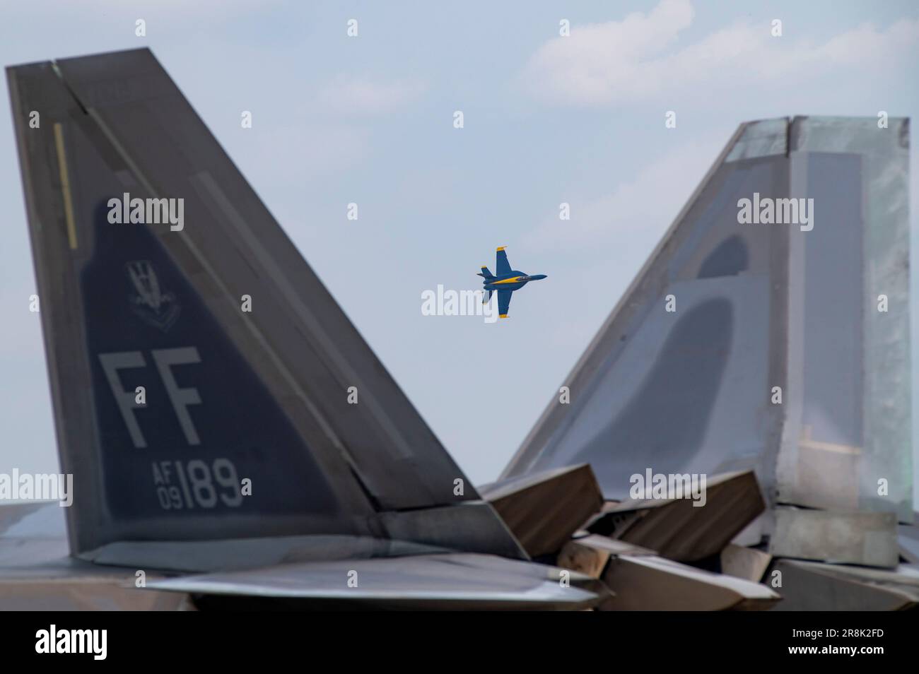 A U.S. Air force F-22 Raptor from the F-22 Raptor Demo Team flies over ...