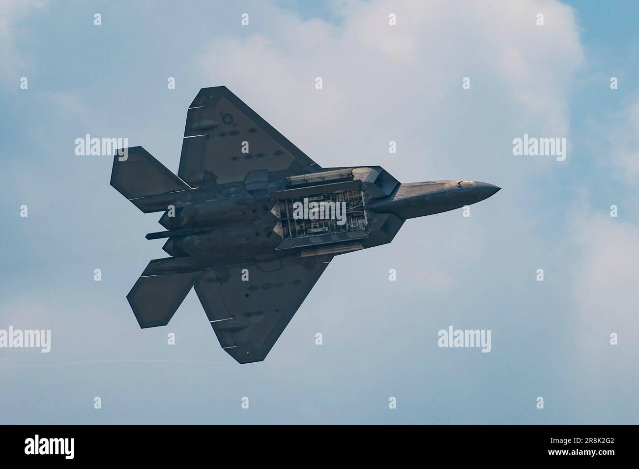 An aircraft from the U.S. Air Force F-22 Raptor Demo Team, piloted by ...