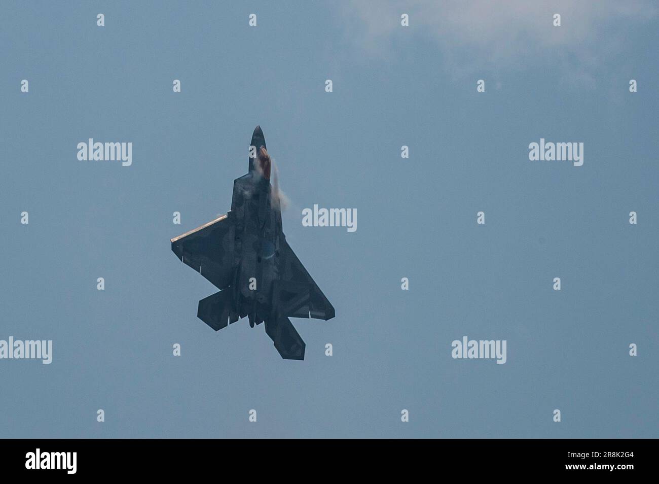 An aircraft from the U.S. Air Force F-22 Raptor Demo Team, piloted by ...