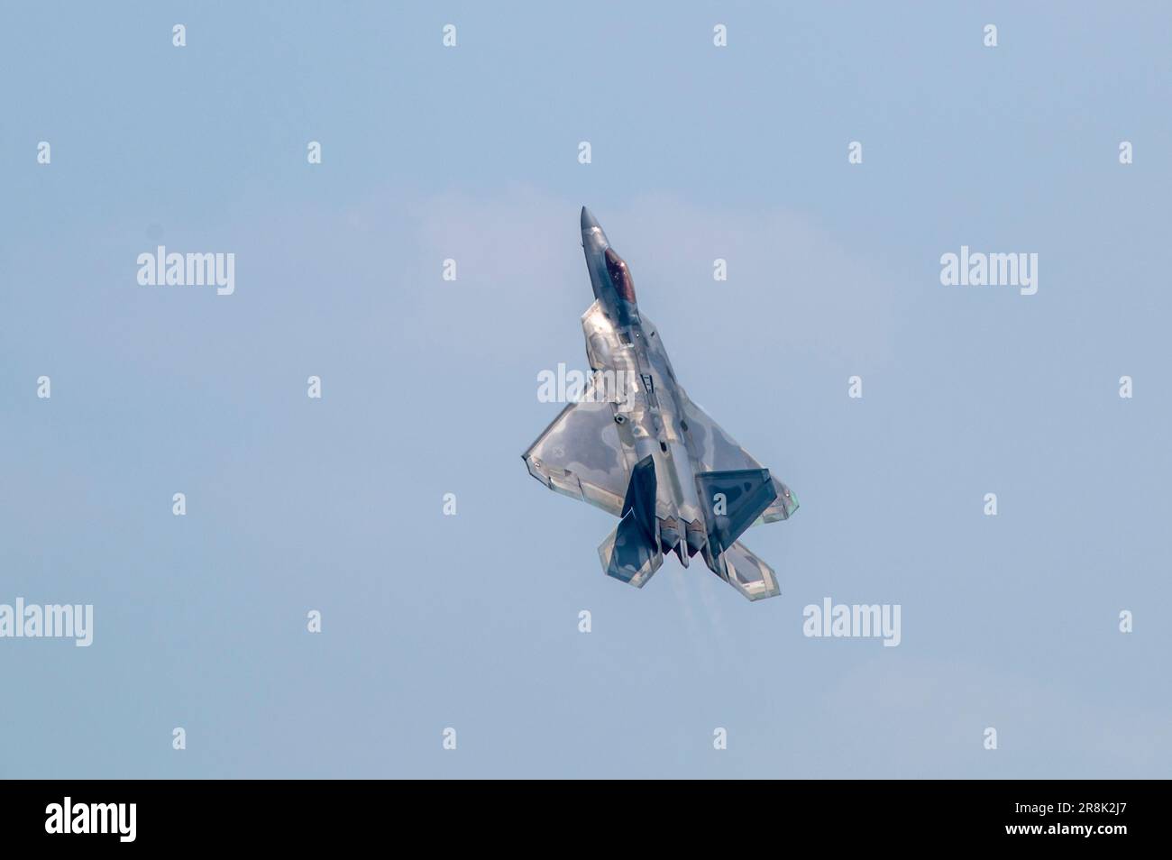 A U.S. Air Force F-22 Raptor performs a demonstration flight flight ...