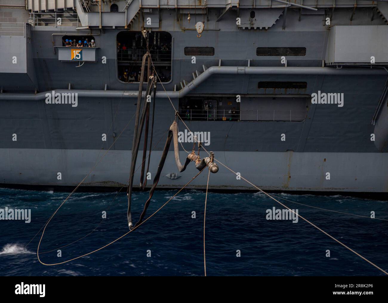 SOUTH CHINA SEA (June 20, 2023) A fuel probe comes across a span wire ...