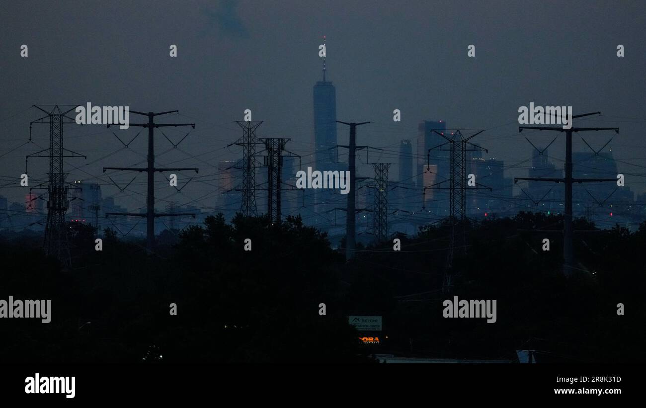 Electrical transmission line are seen in Iselin, N.J., Wednesday, June ...
