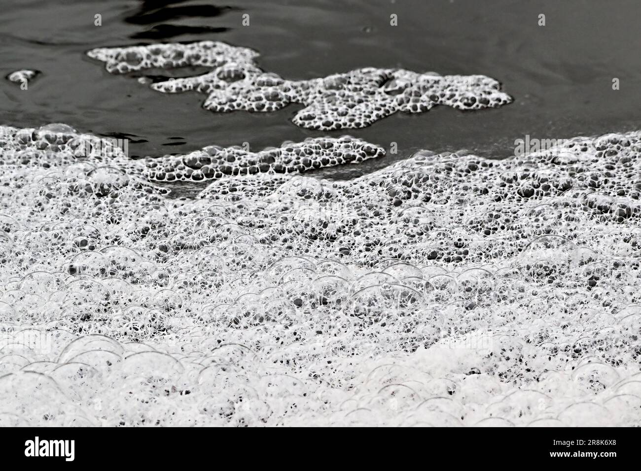 Air bubbles on a fast moving stream Stock Photo - Alamy