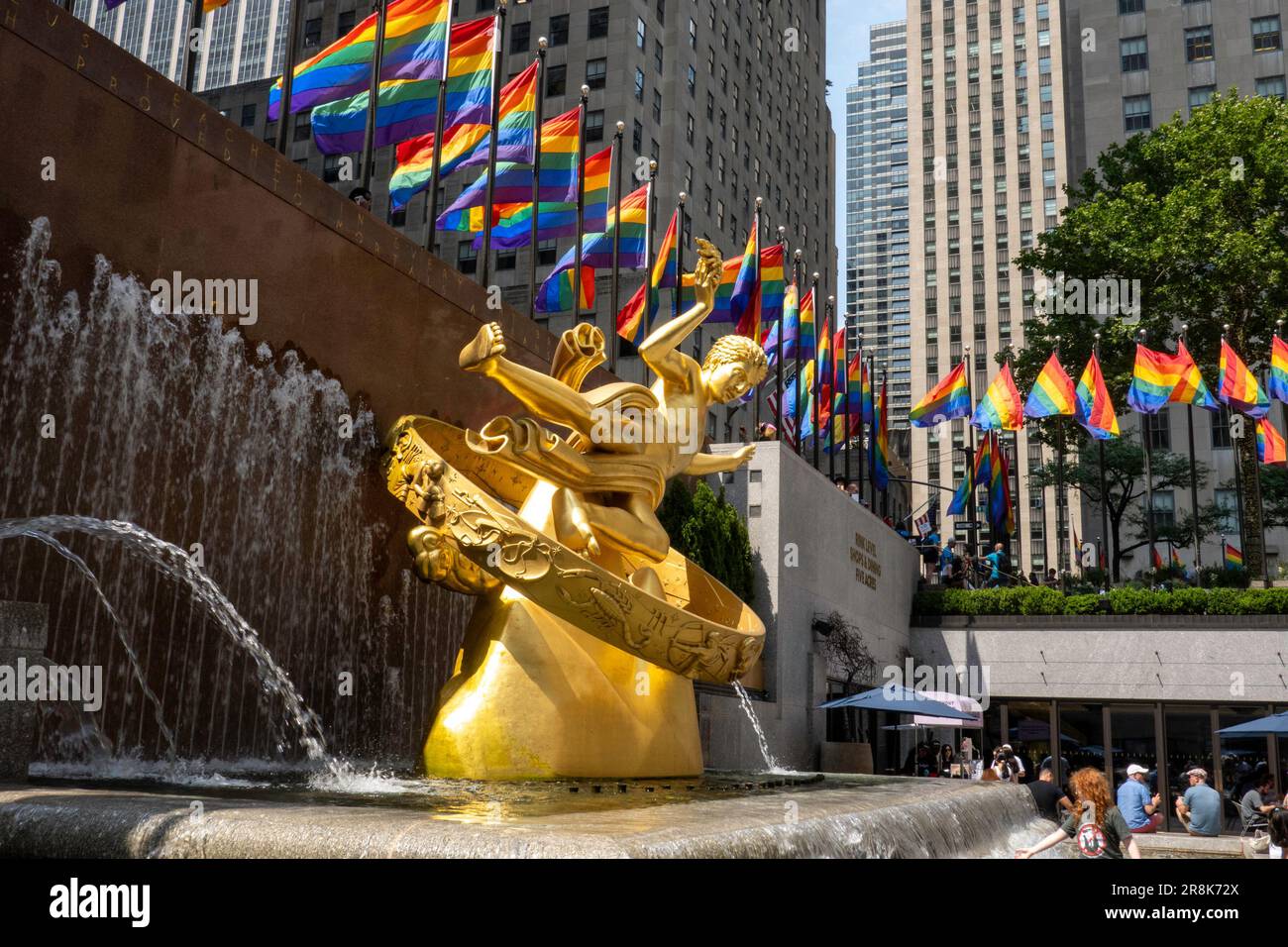 Prometheus with Rainbow color flags celebrate WorldPride at Rockefeller Center Plaza, NYC, USA ...