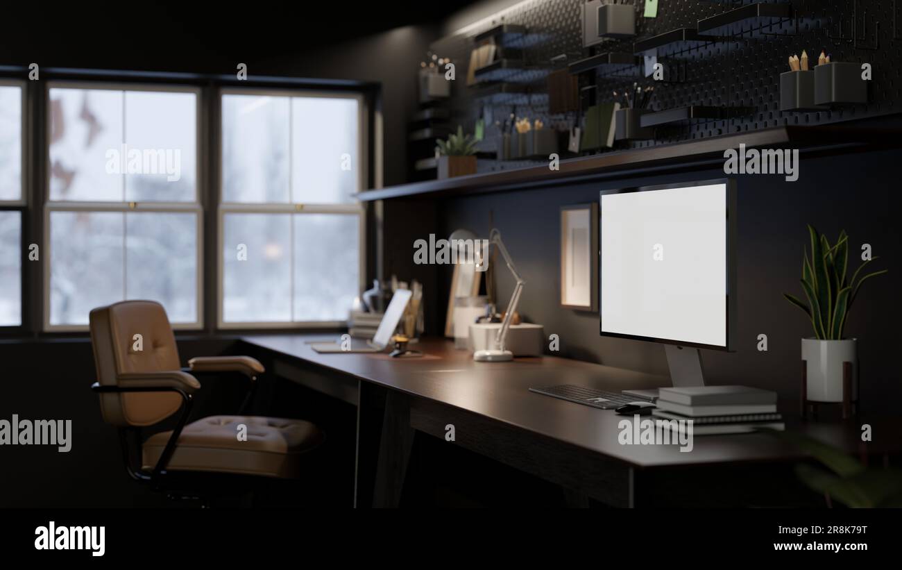 Interior design of a modern dark loft home office with computer blank screen mockup and ...
