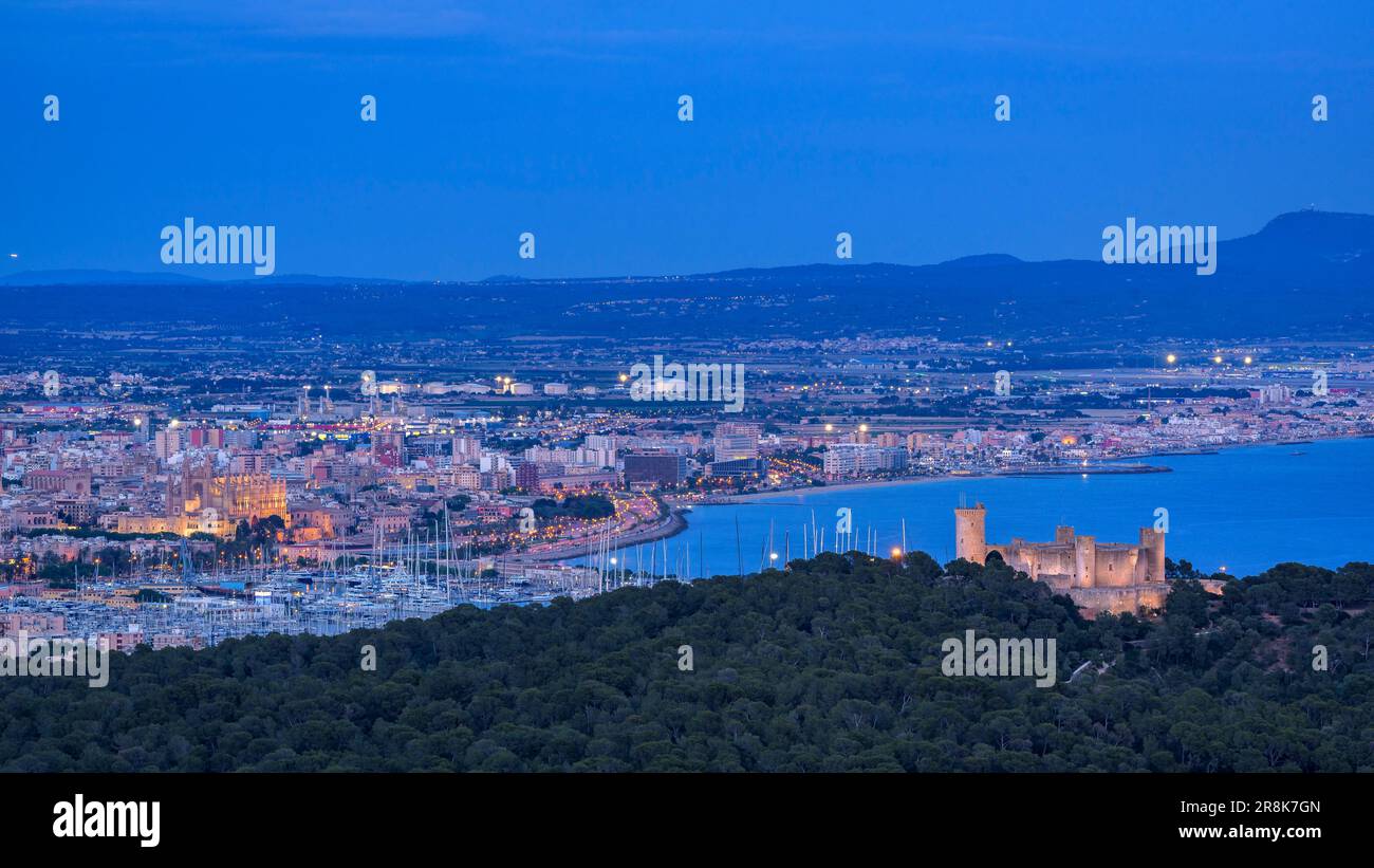 City of Palma de Mallorca and the Bellver castle and hill at twilight ...