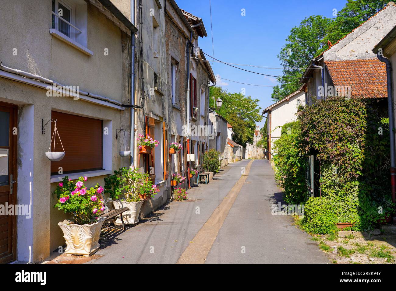 Old residential street of Crécy la Chapelle, a village of the French ...