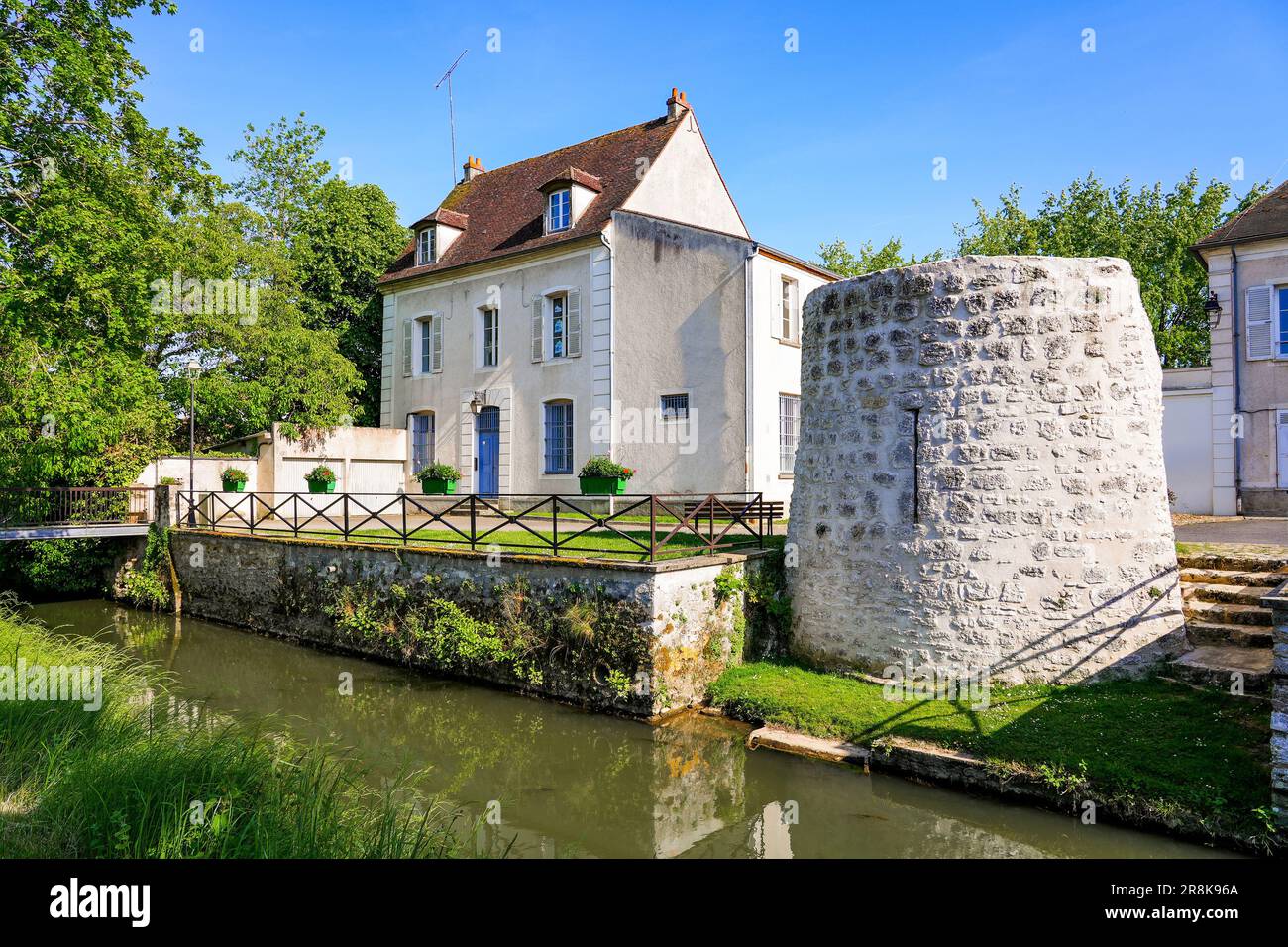 Home built next to the ruins of a medieval fortification tower by the ...