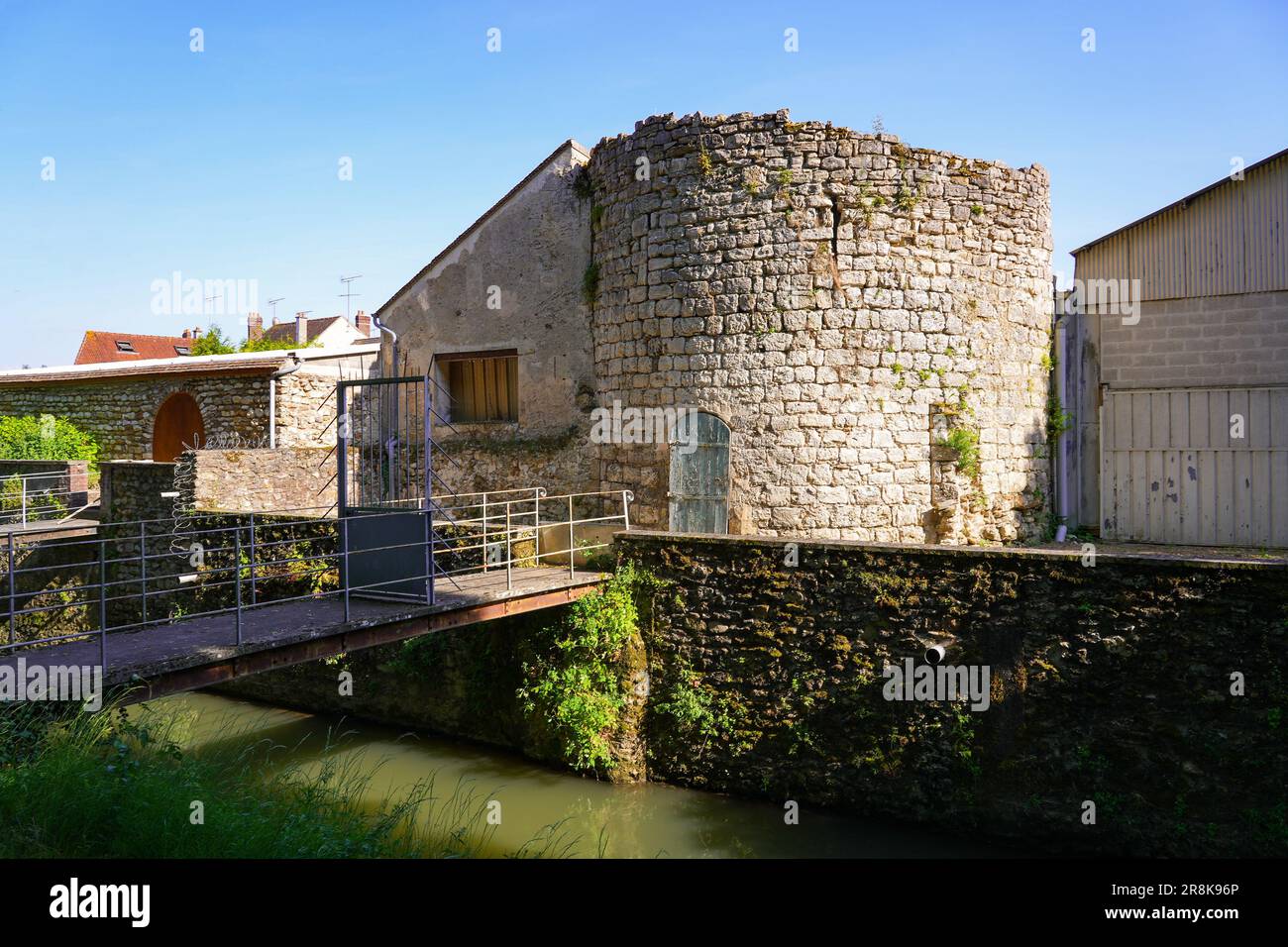 Home built next to the ruins of a medieval fortification tower by the ...