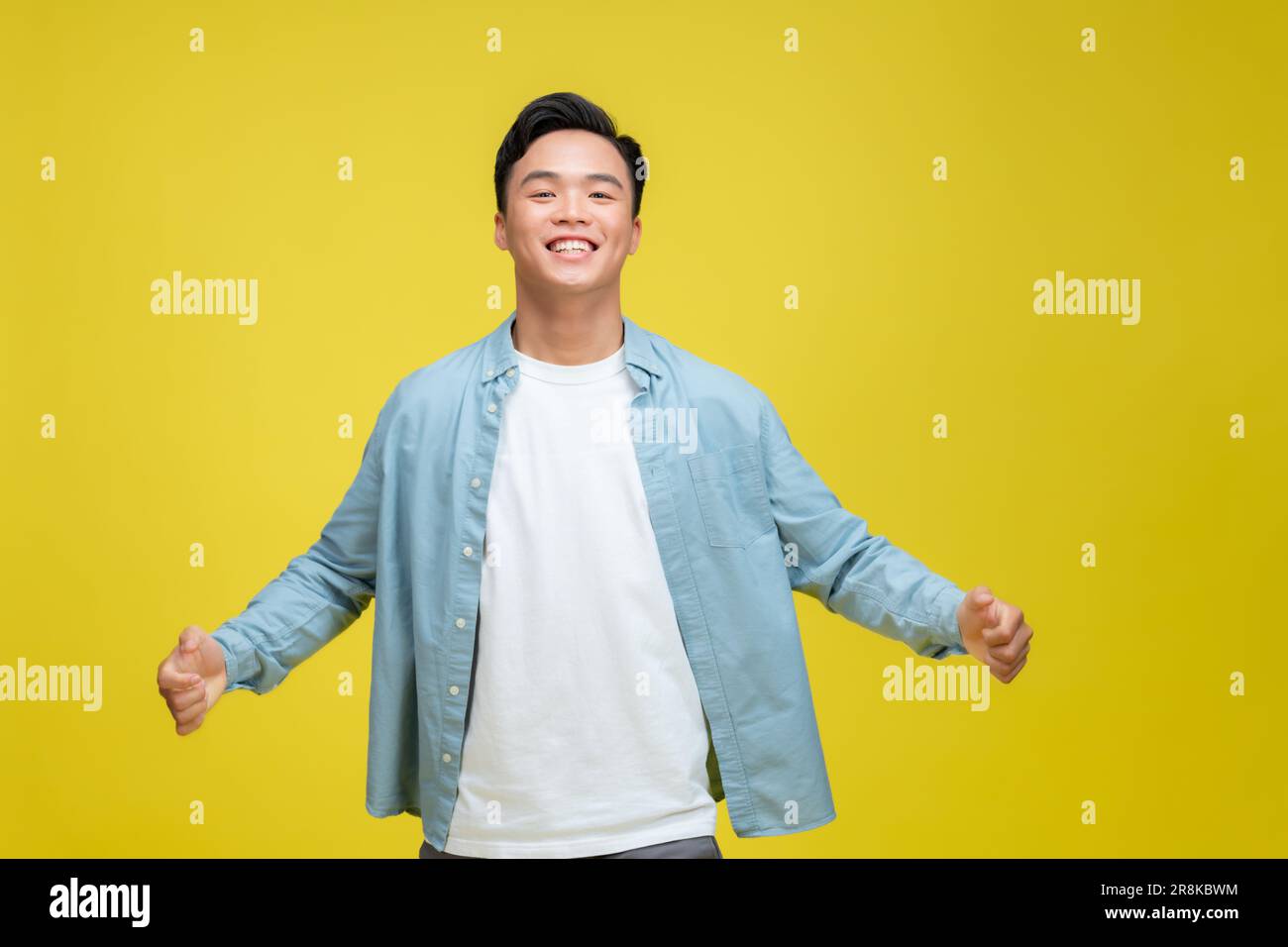 Excited young man celebrating hi-res stock photography and images - Alamy
