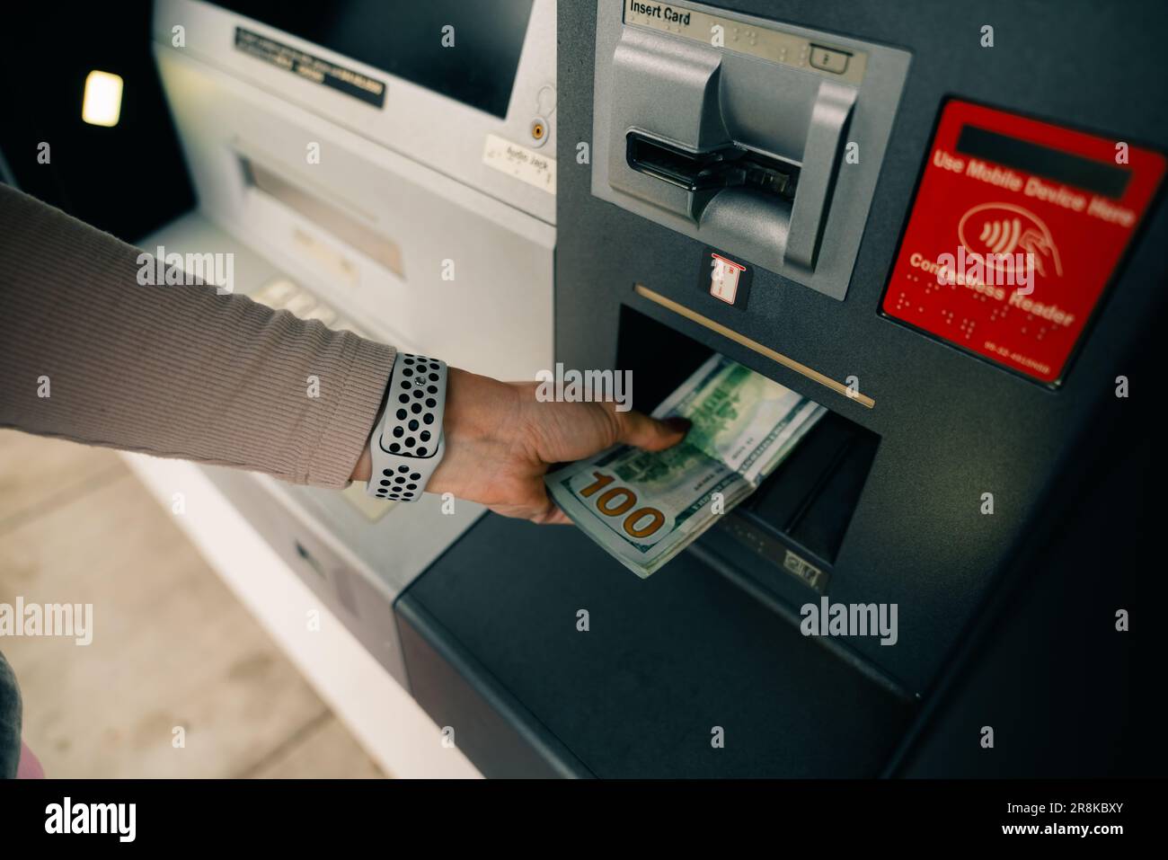 Woman atm secret hi-res stock photography and images - Alamy