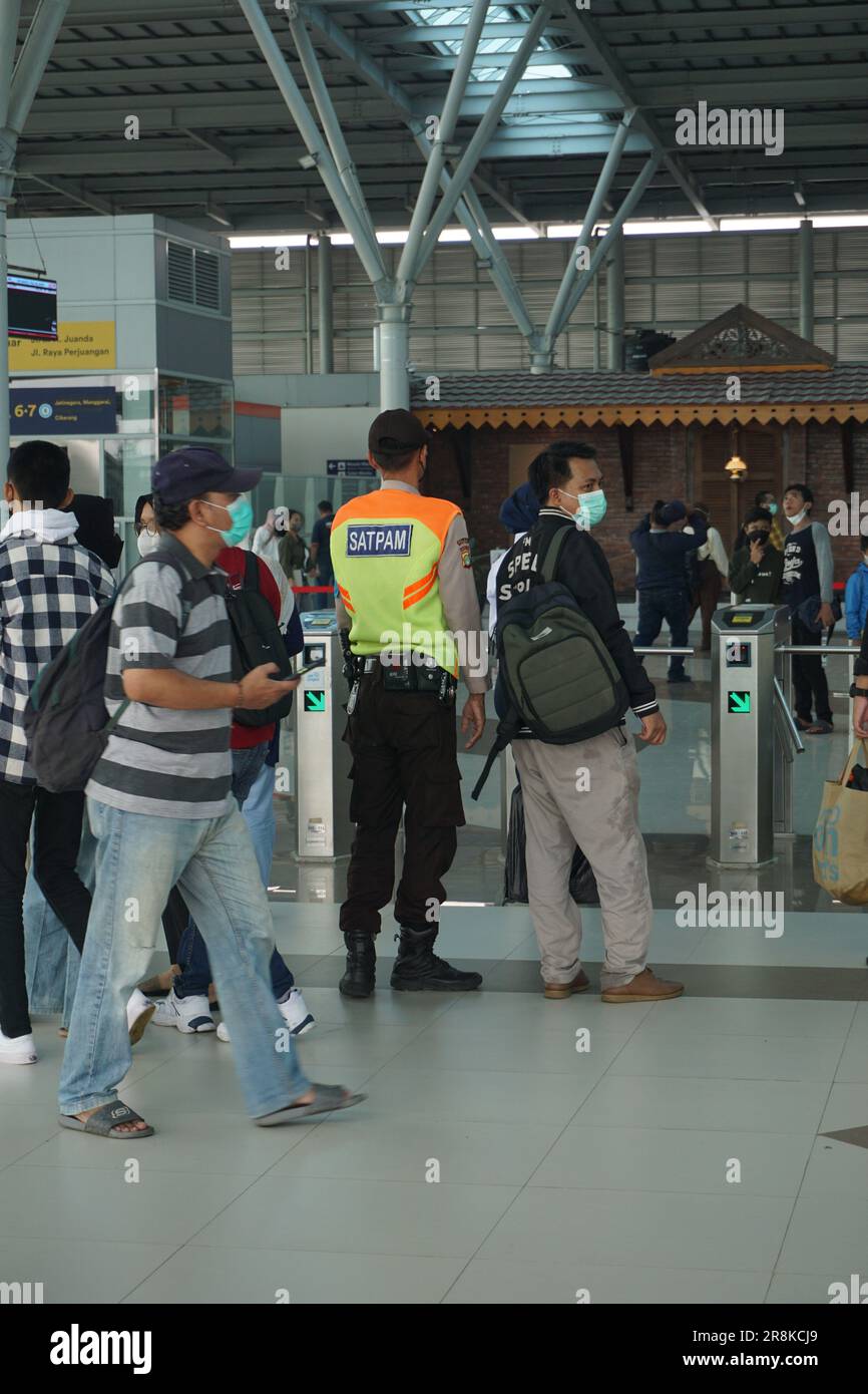 you can see the train security giving instructions to train passengers ...