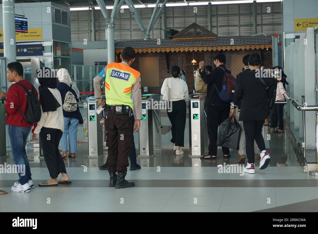 you can see the train security giving instructions to train passengers ...