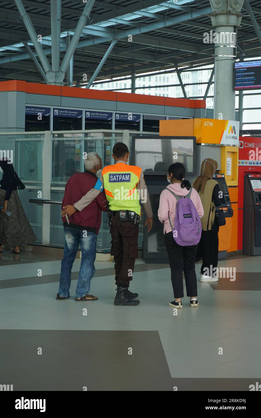 you can see the train security giving instructions to train passengers ...