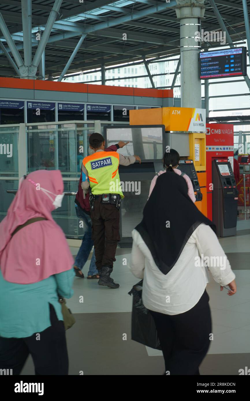 you can see the train security giving instructions to train passengers ...
