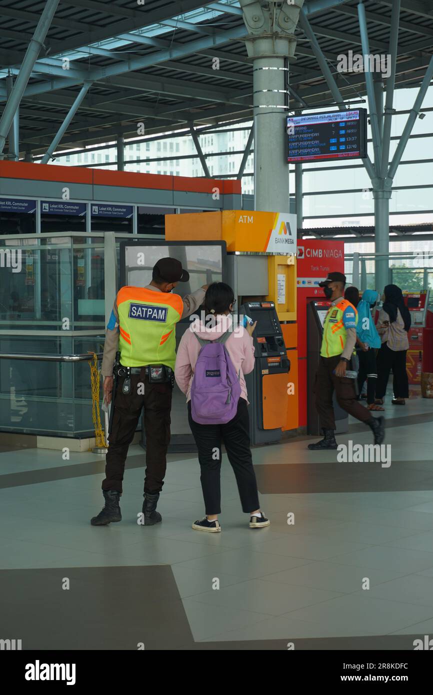 you can see the train security giving instructions to train passengers ...