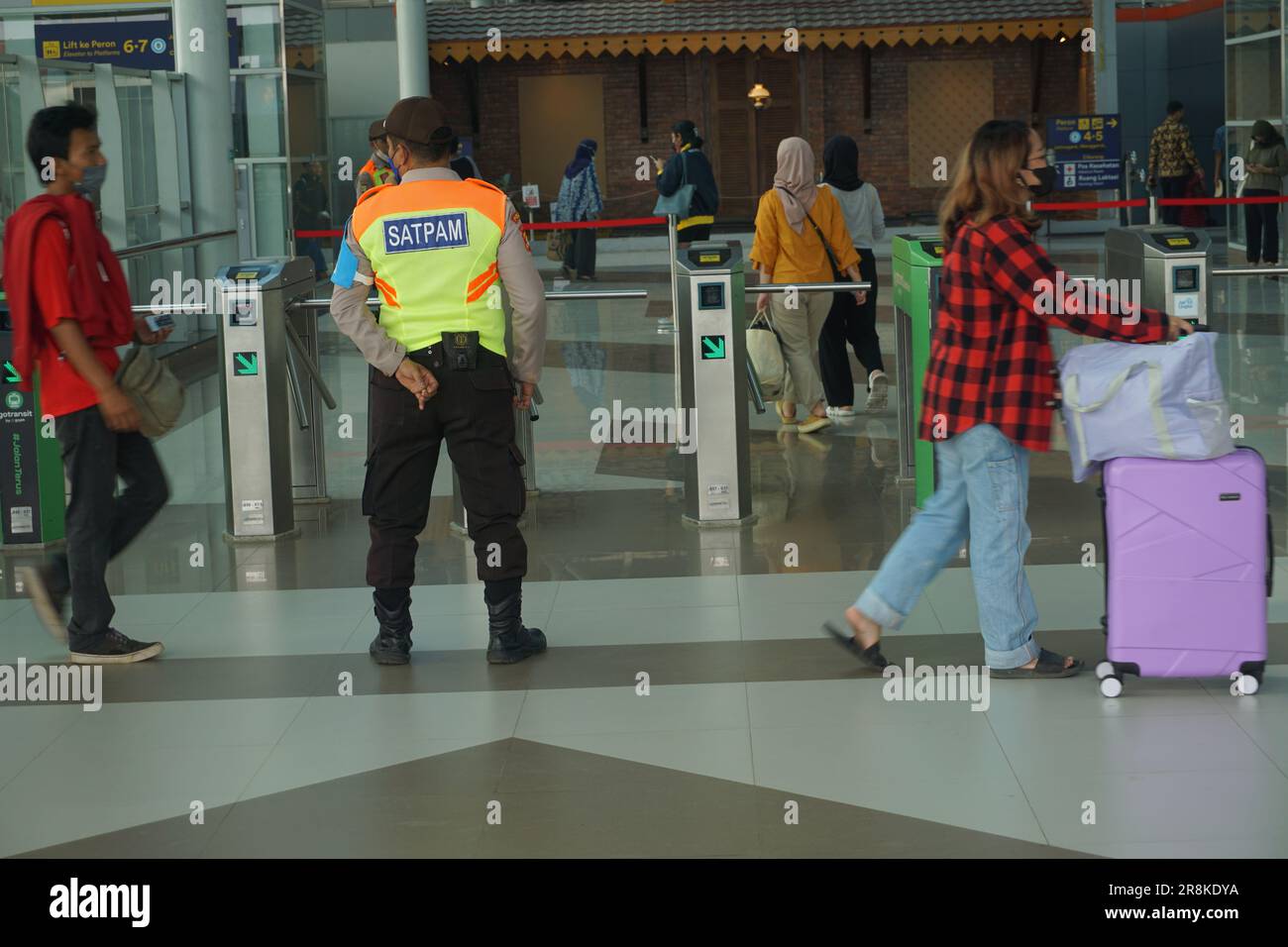 you can see the train security giving instructions to train passengers ...