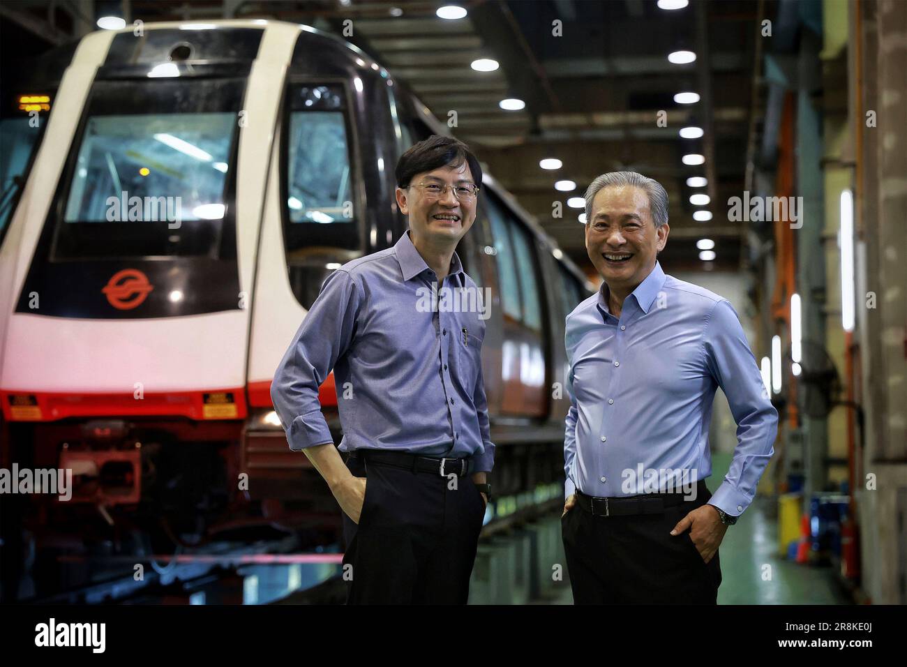 Ngien Hoon Ping (left) group chief executive of public transport operator SMRT Corporation and ...