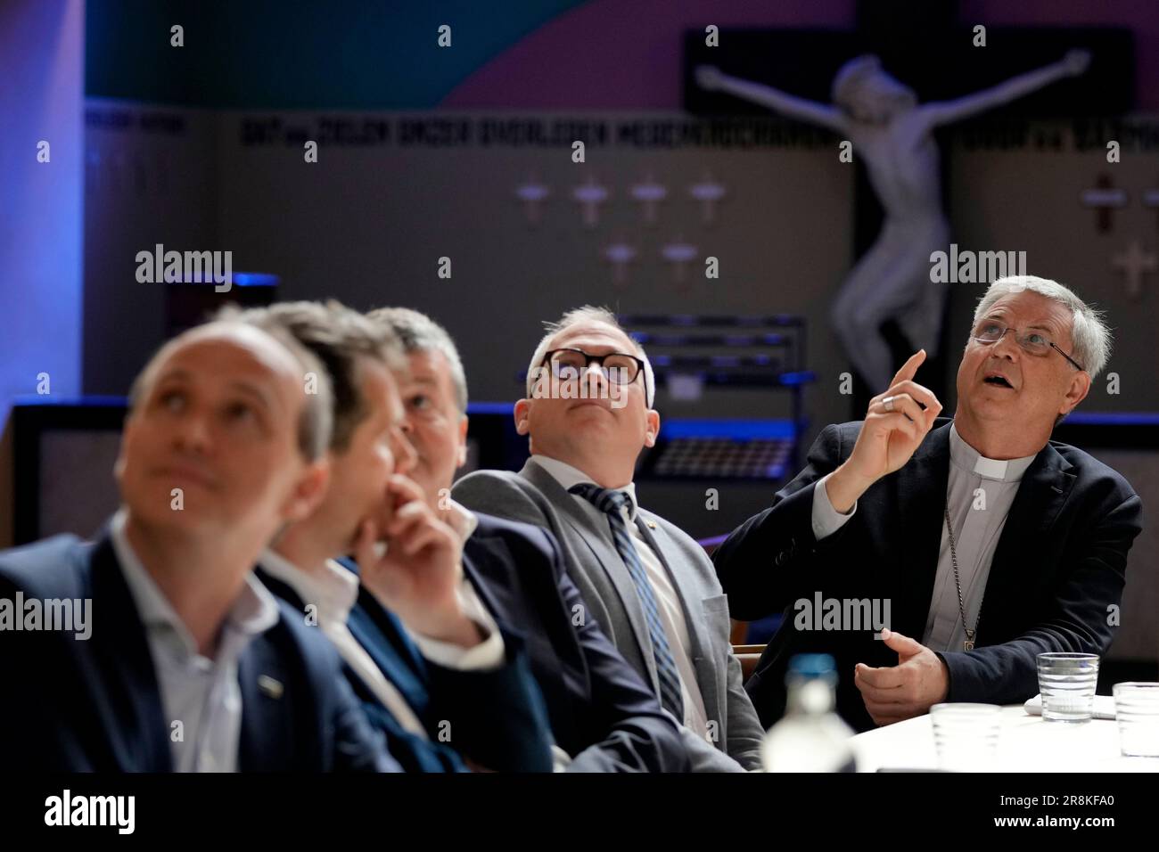 Bishop of Antwerp, Johan Bonny, right, speaks during a media conference ...