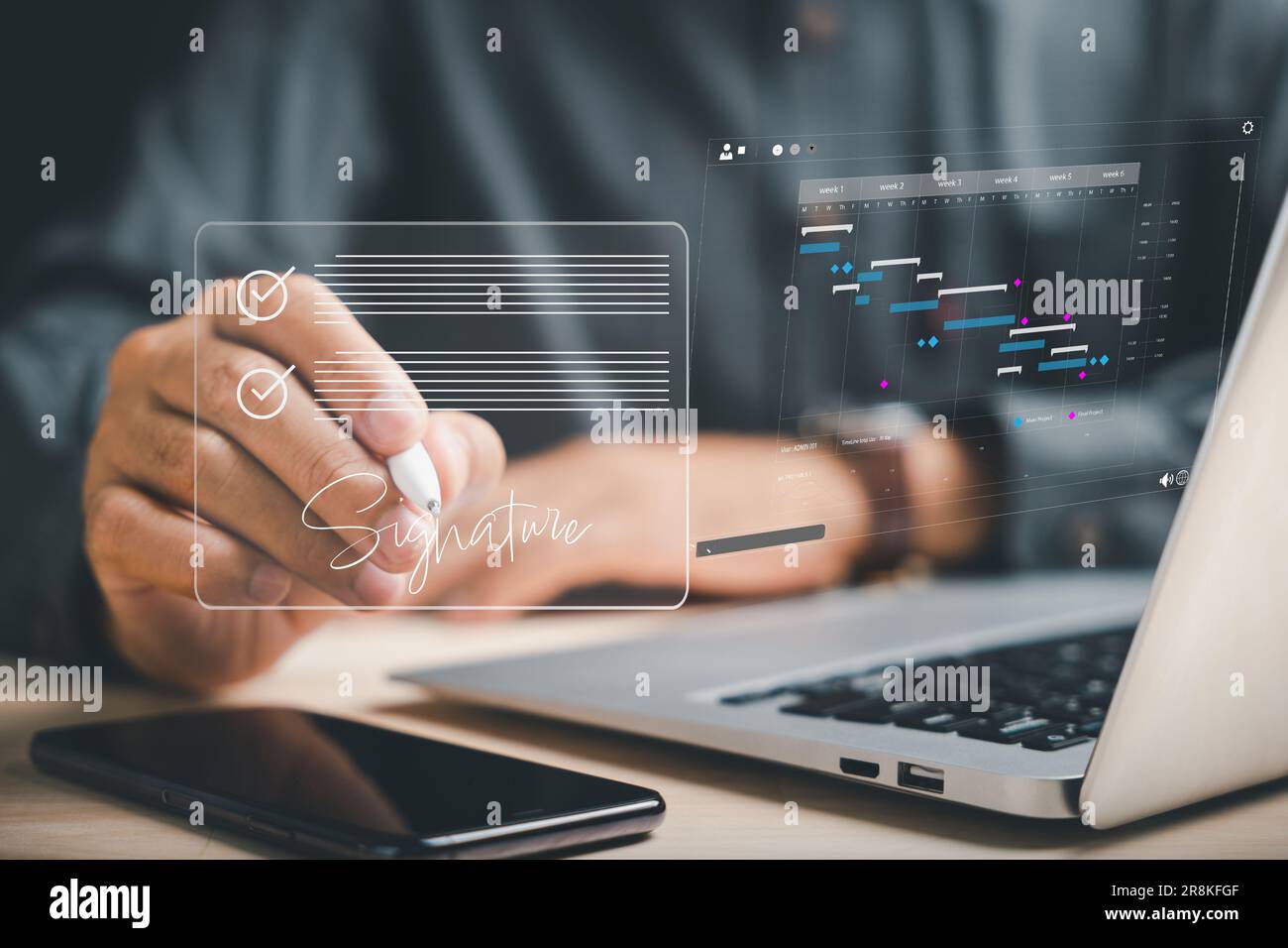 Efficient document management Businessman uses pen to sign electronic ...