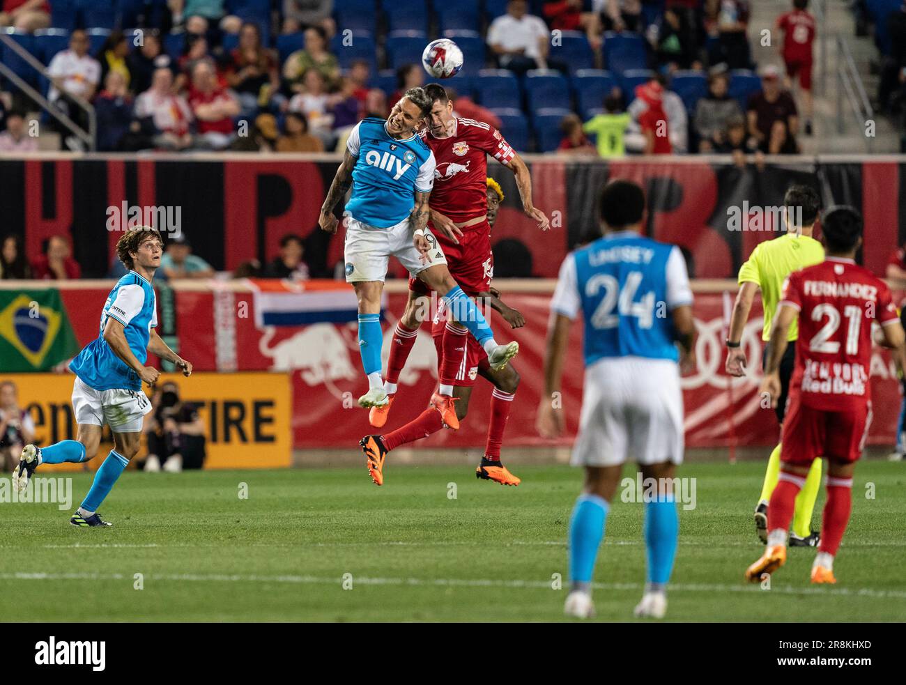 Sean Nealis (15) of Red Bulls and Enzo Copetti (9) fight for ball ...