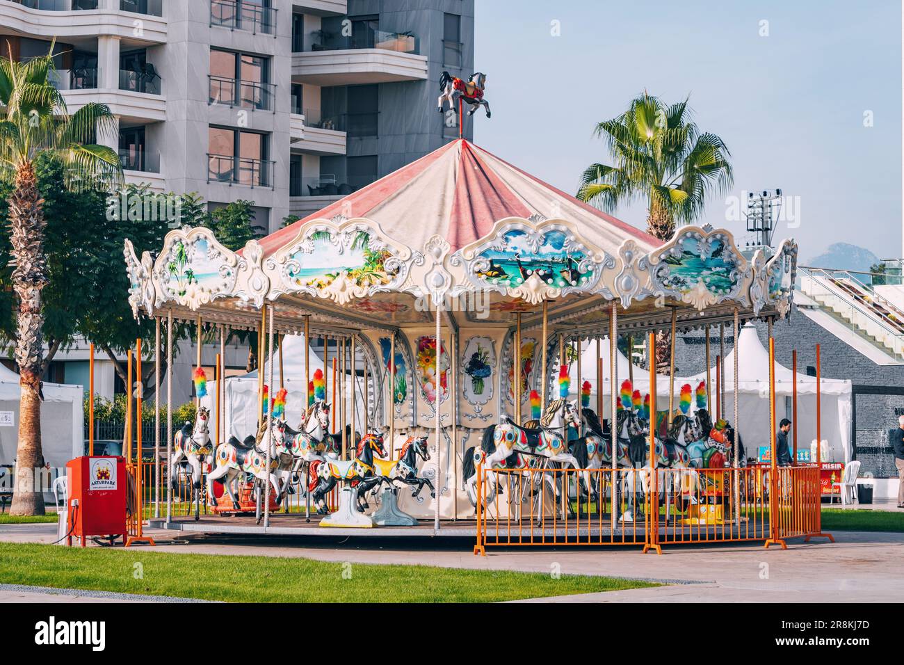 17 December 2022: Antalya, Turkey: Roundabout carousel at city square ...