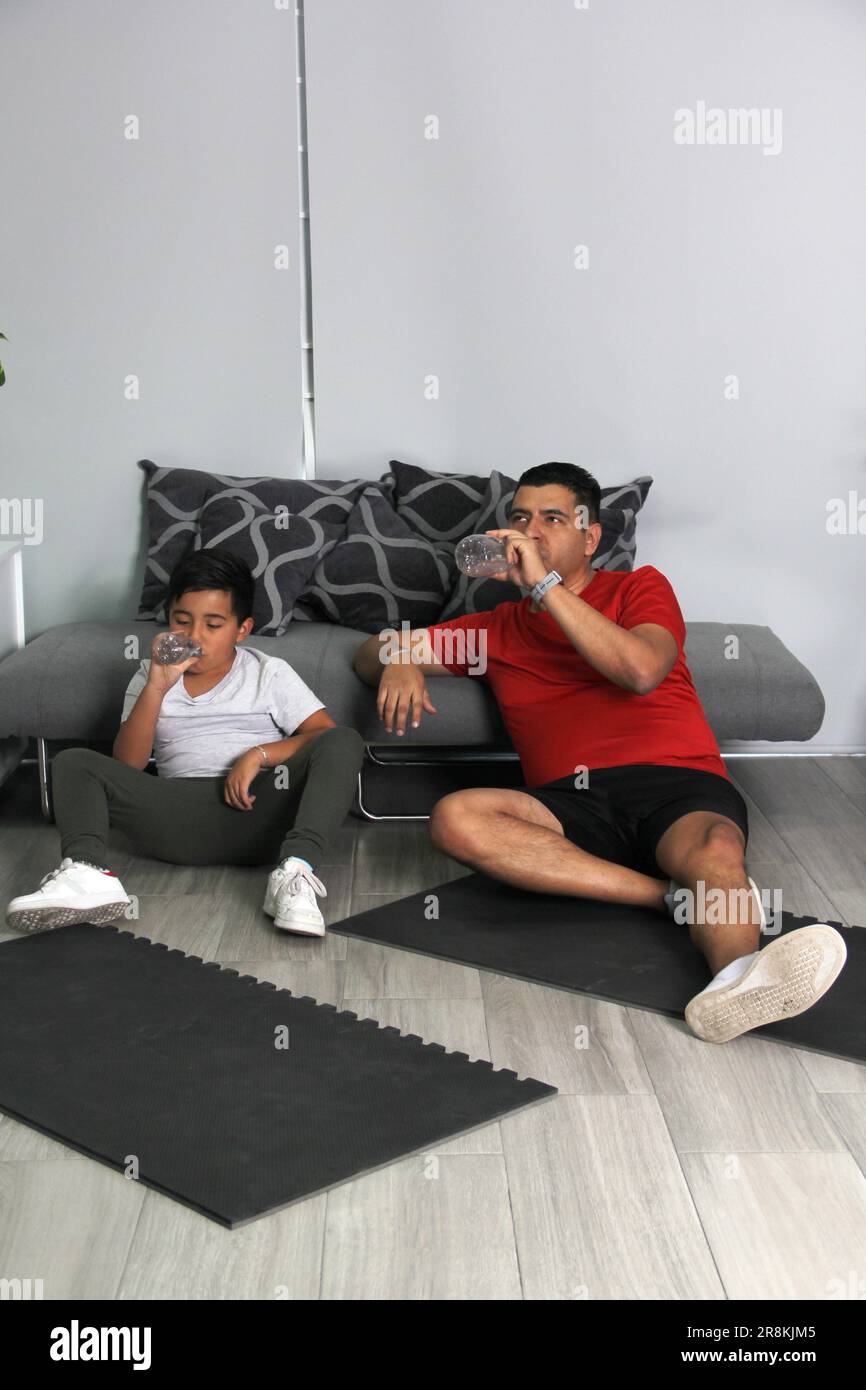 Fat kid exercising dad hi-res stock photography and images - Alamy