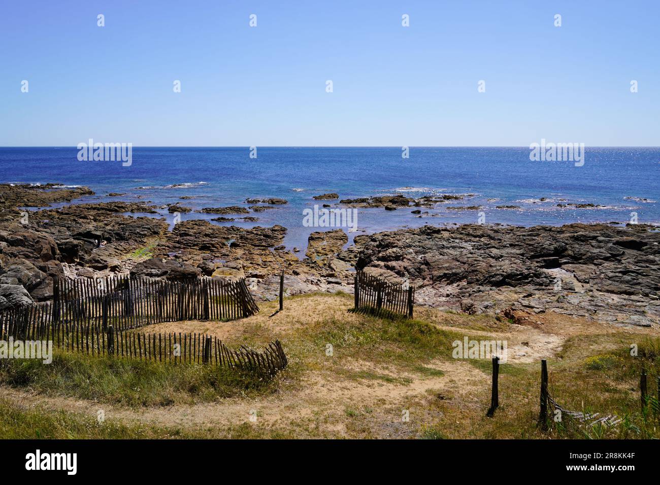 sand pathway coast access rocks beach entrance to ocean atlantic sea in ...