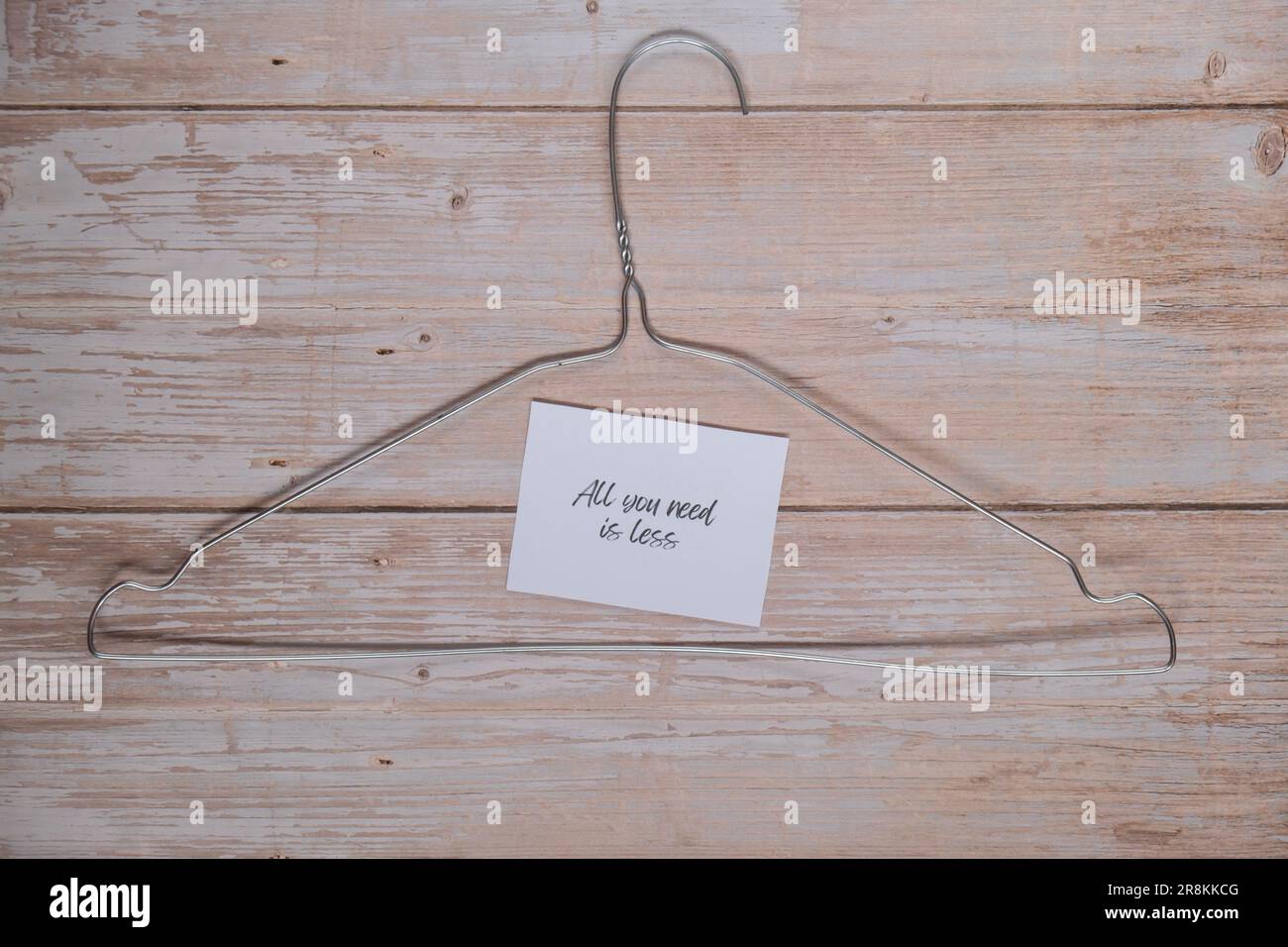 ALL YOU NEED IS LESS text with clothes rack. Second hand sustainable ...
