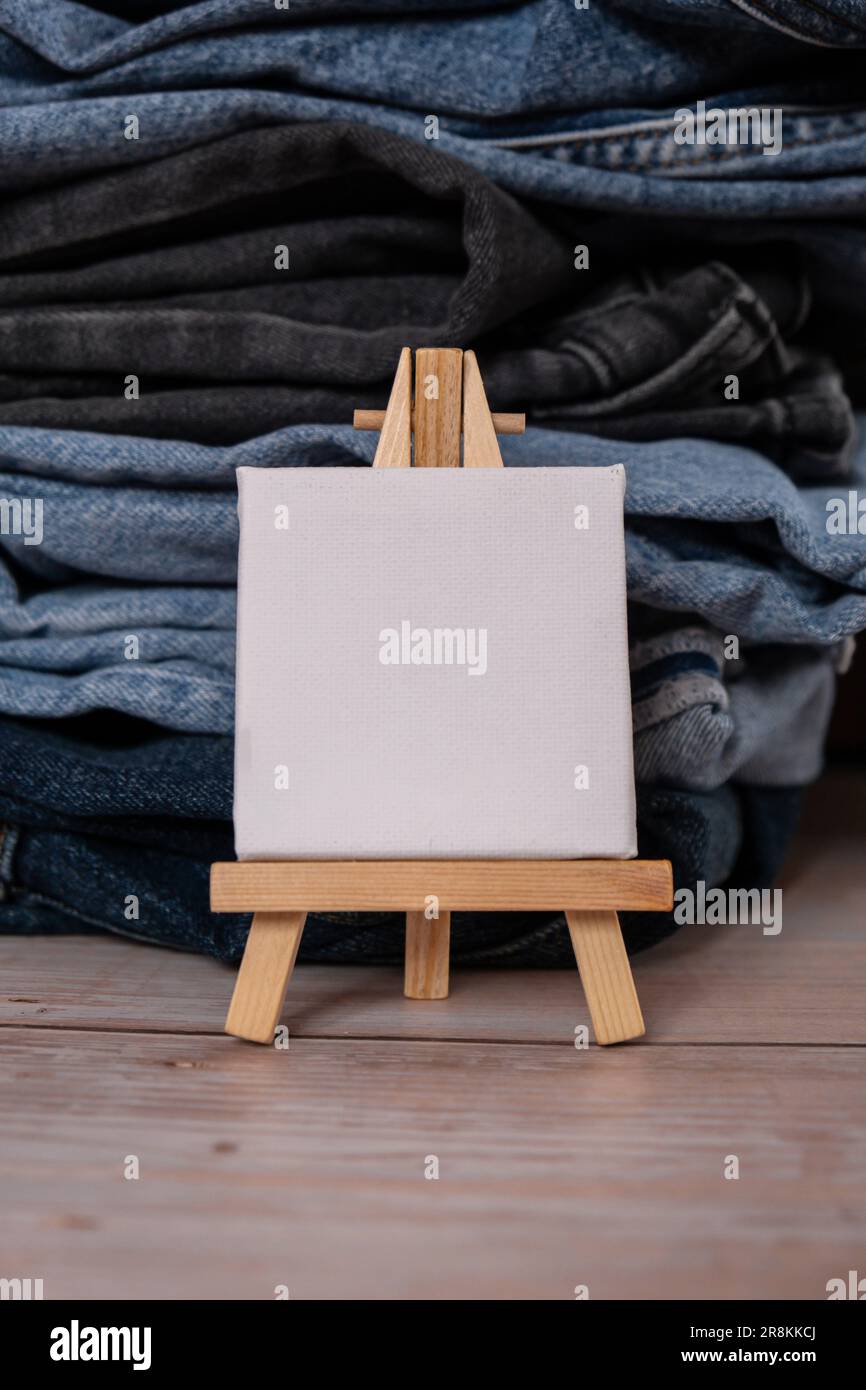 Empty board with copy space for your text. Abstract Stack of jeans ...