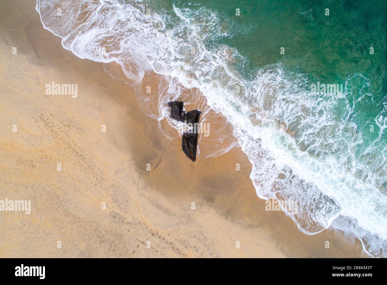 zenithal aerial view of a beach at sunrise Stock Photo - Alamy