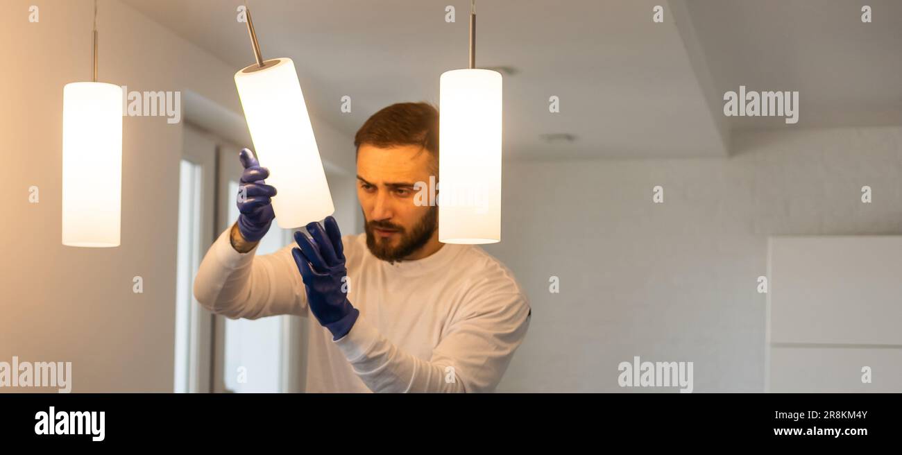 Home Ceiling Light Equipment Maintenance. Professional Electrician ...