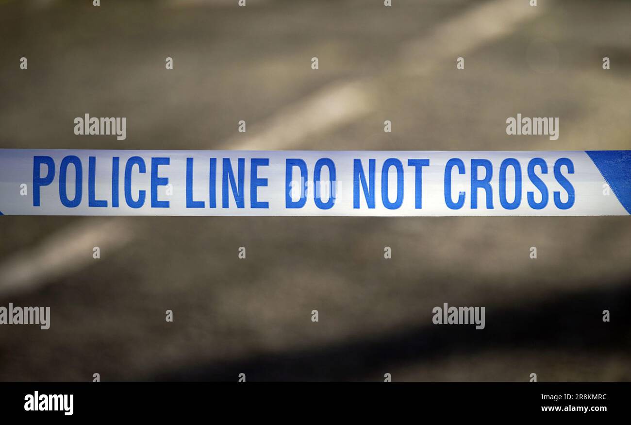 File photo dated 19/11/21 of police tape near a scene of a suspected ...