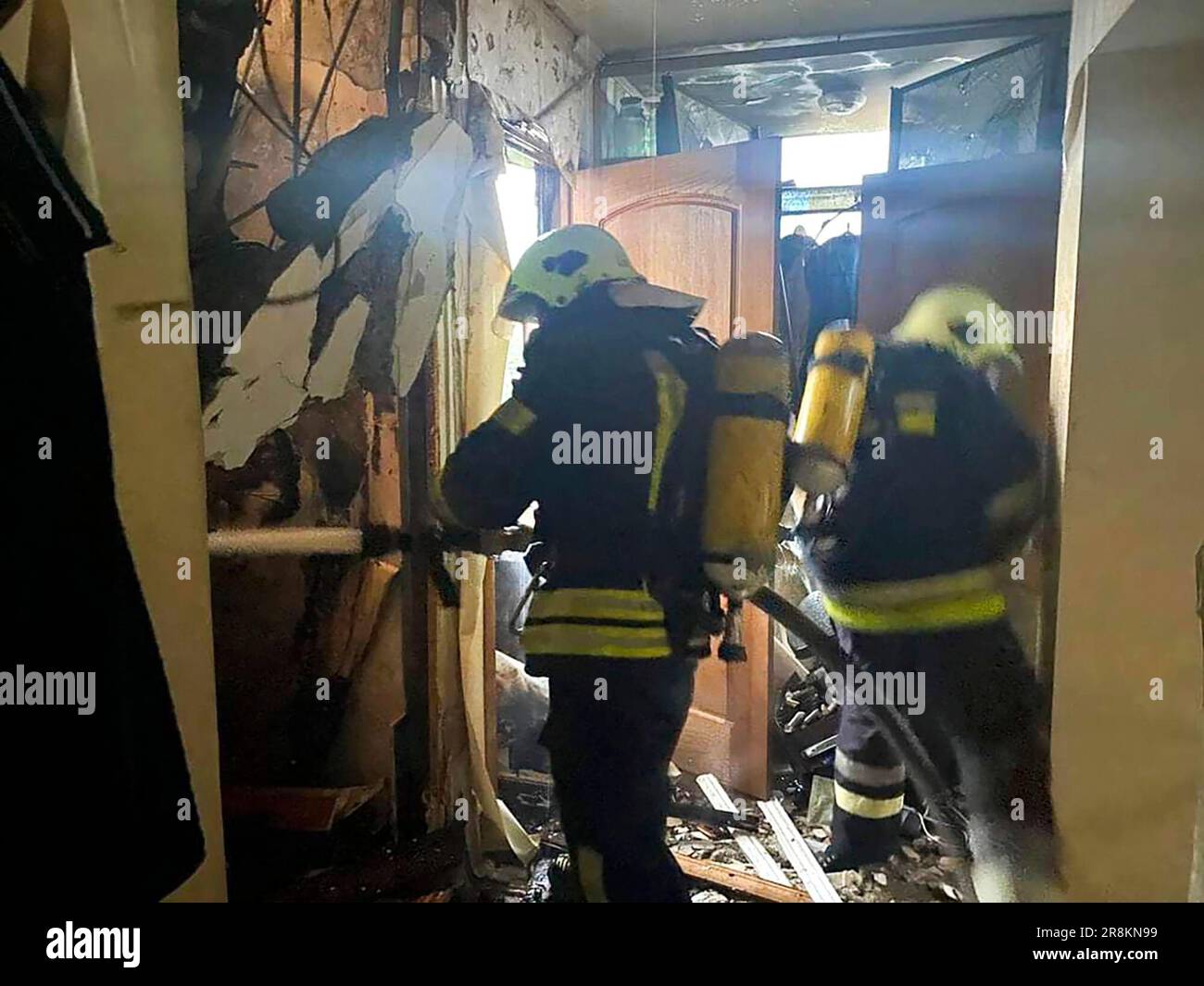 In this photo provided by the Ukrainian Emergency Service, rescuers ...