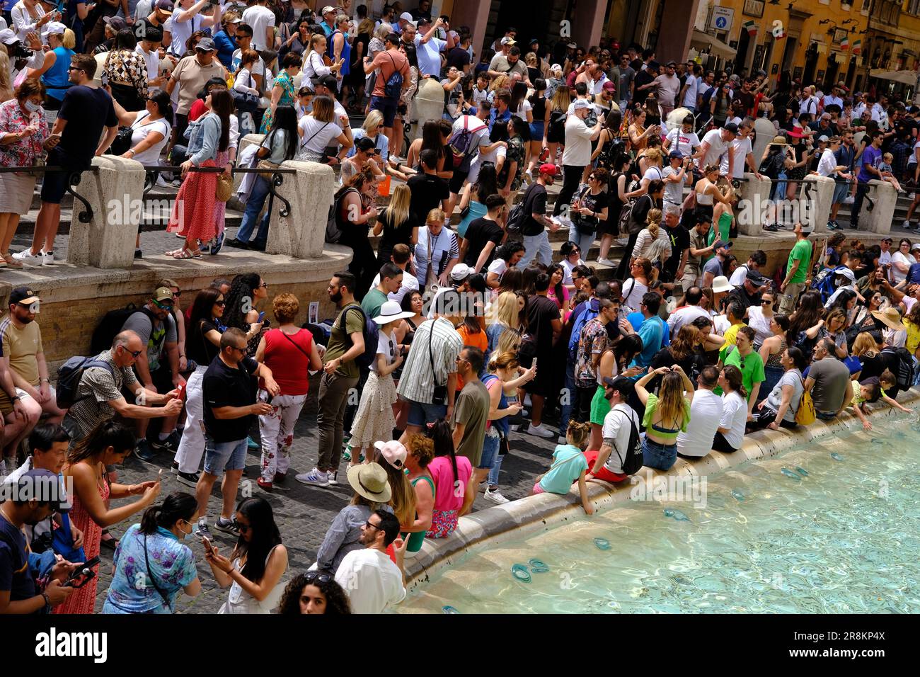 Crowds gather around the Trevi Fountain in Rome Italy Stock Photo - Alamy